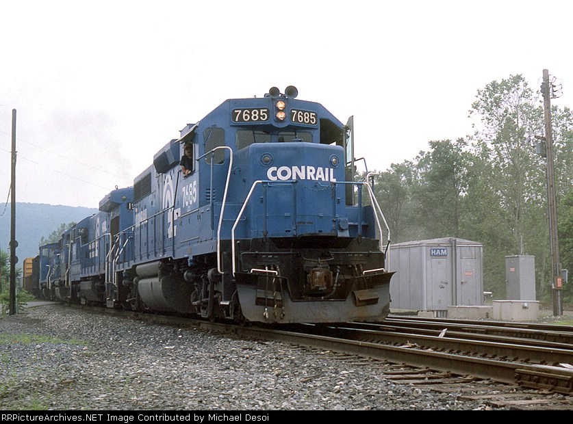 CR GP-38 7685 leads a freight at CP Ham
